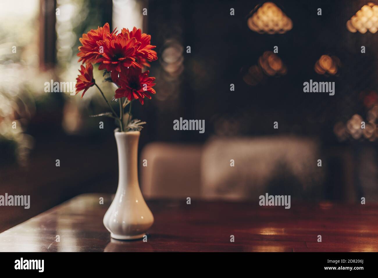 white vase with beautiful flowers Stock Photo - Alamy