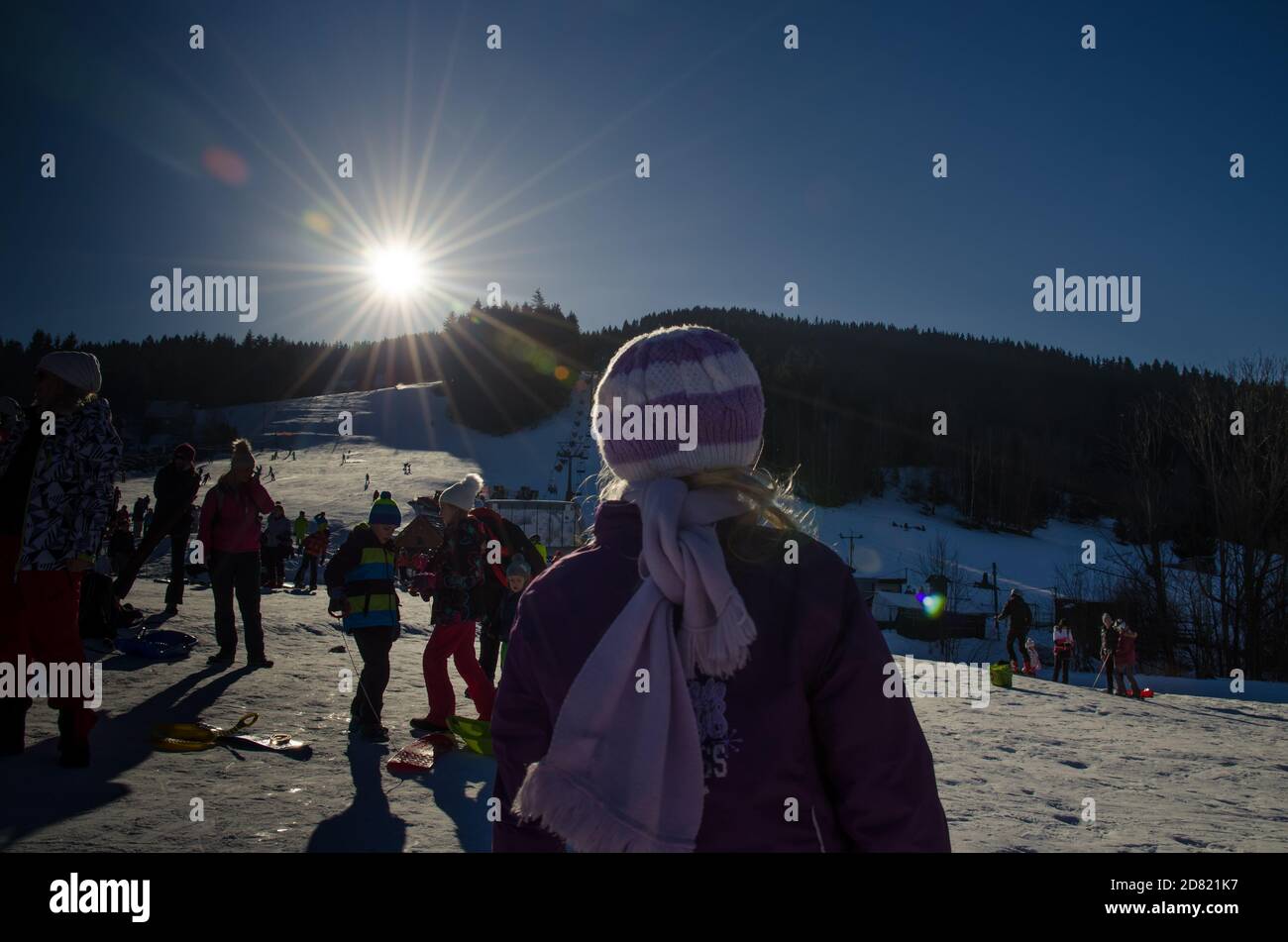 child back view in winter time during sunset Stock Photo - Alamy