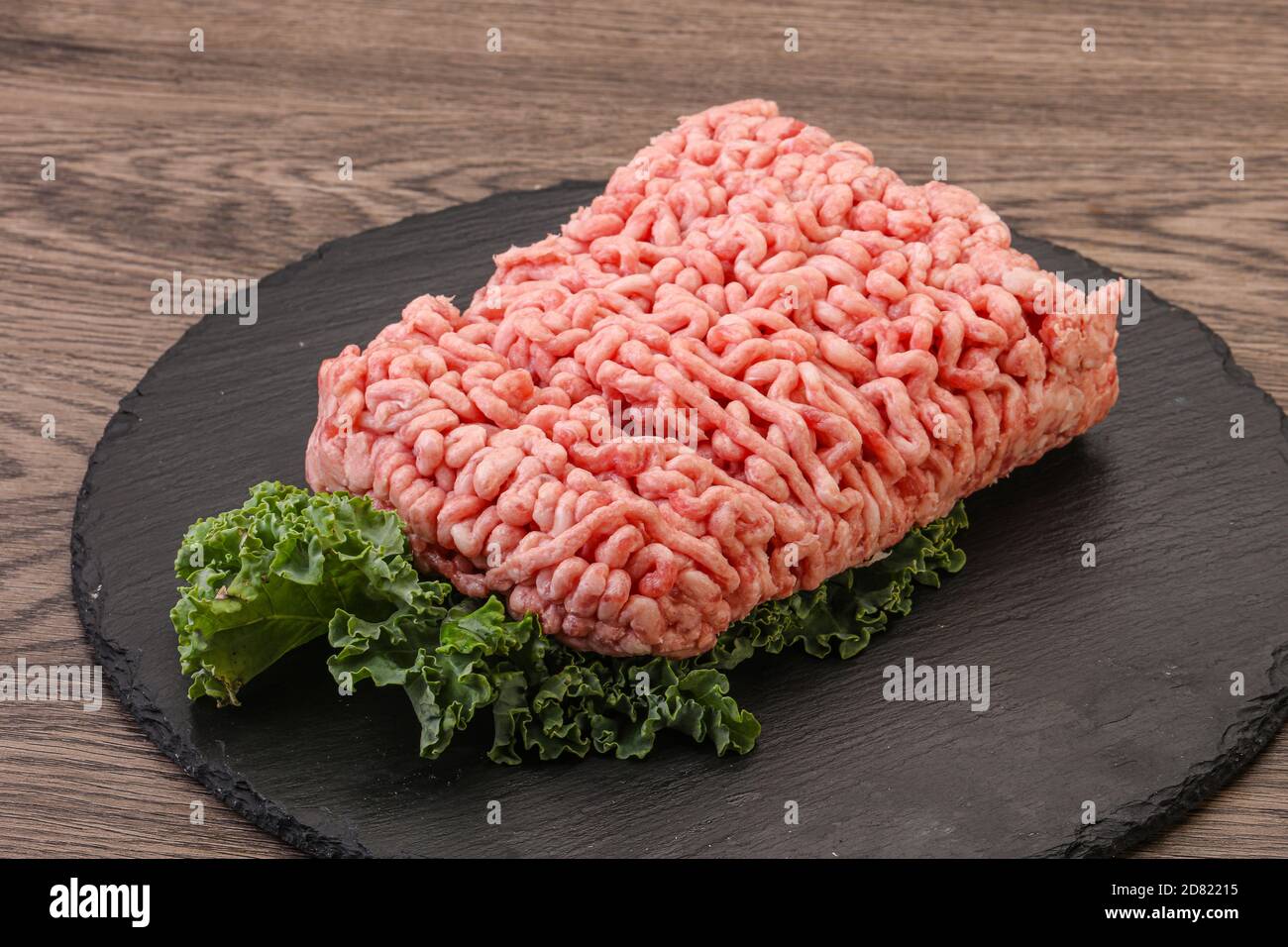 Raw pork minced meat with spices for cooking Stock Photo - Alamy