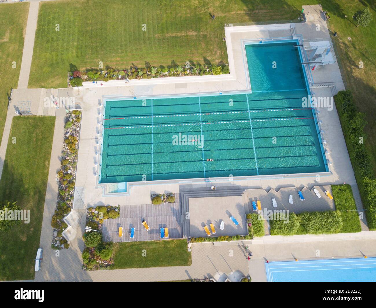 Aerial view of the open air swimming pool in the middle of the summer ...