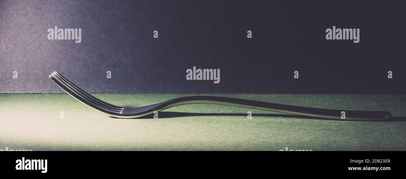 Simple fork - concept of eating food in a restaurant Stock Photo - Alamy