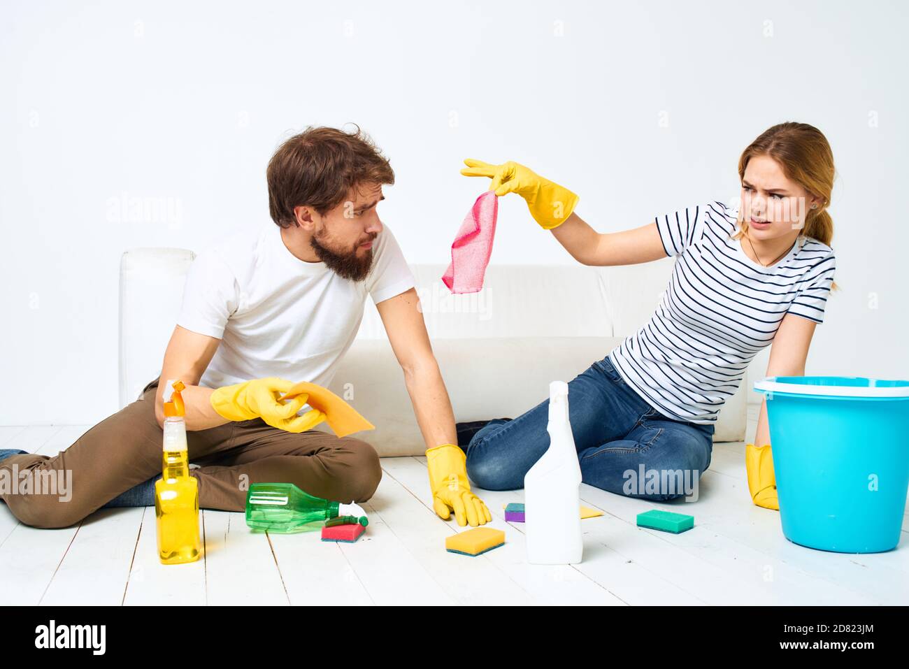 Married couple joint cleaning girlfriend detergent lifestyle Stock ...