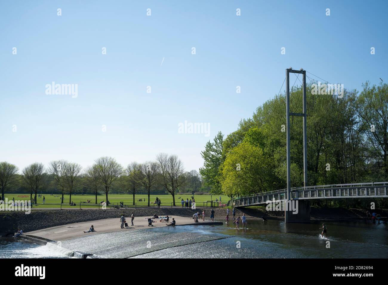 A man jumps off a bridge into the River Taff in Cardiff, Wales, United ...