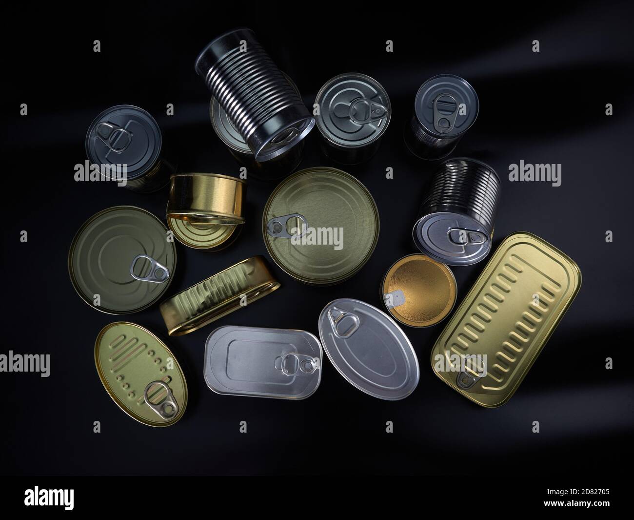 Different types of cans with prepared foods for consumption, vegetables ...