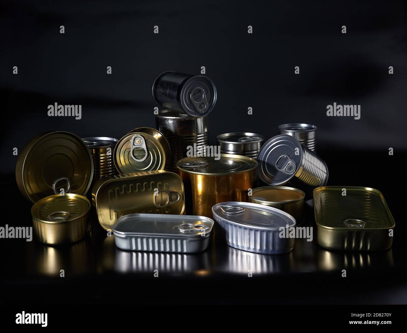 Different types of cans with prepared foods for consumption, vegetables ...