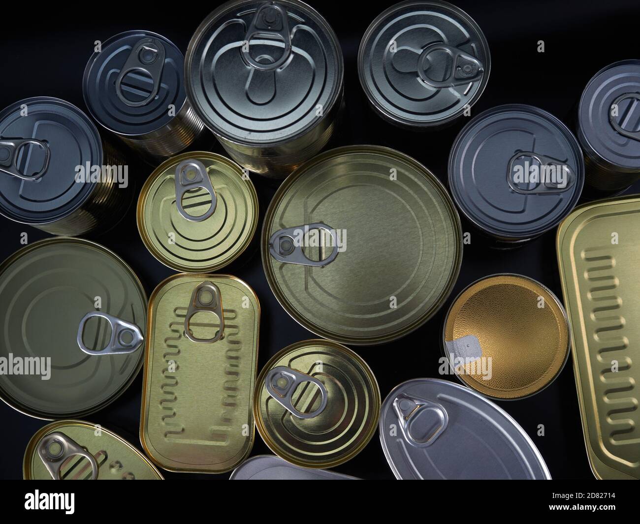 Different types of cans with prepared foods for consumption, vegetables ...