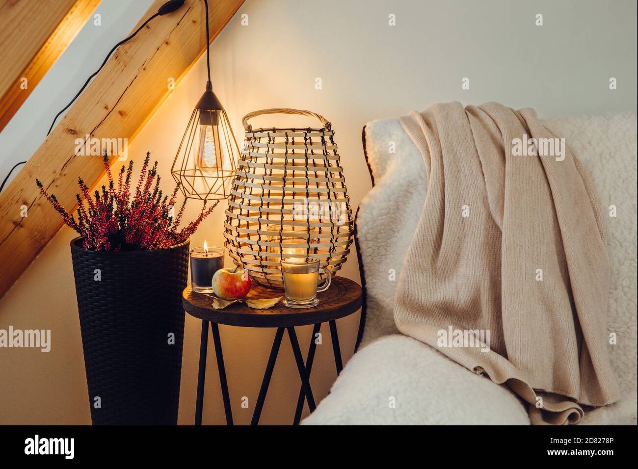 Cozy sick day at home. Table with hot tea cup, garlic and jar of honey ...