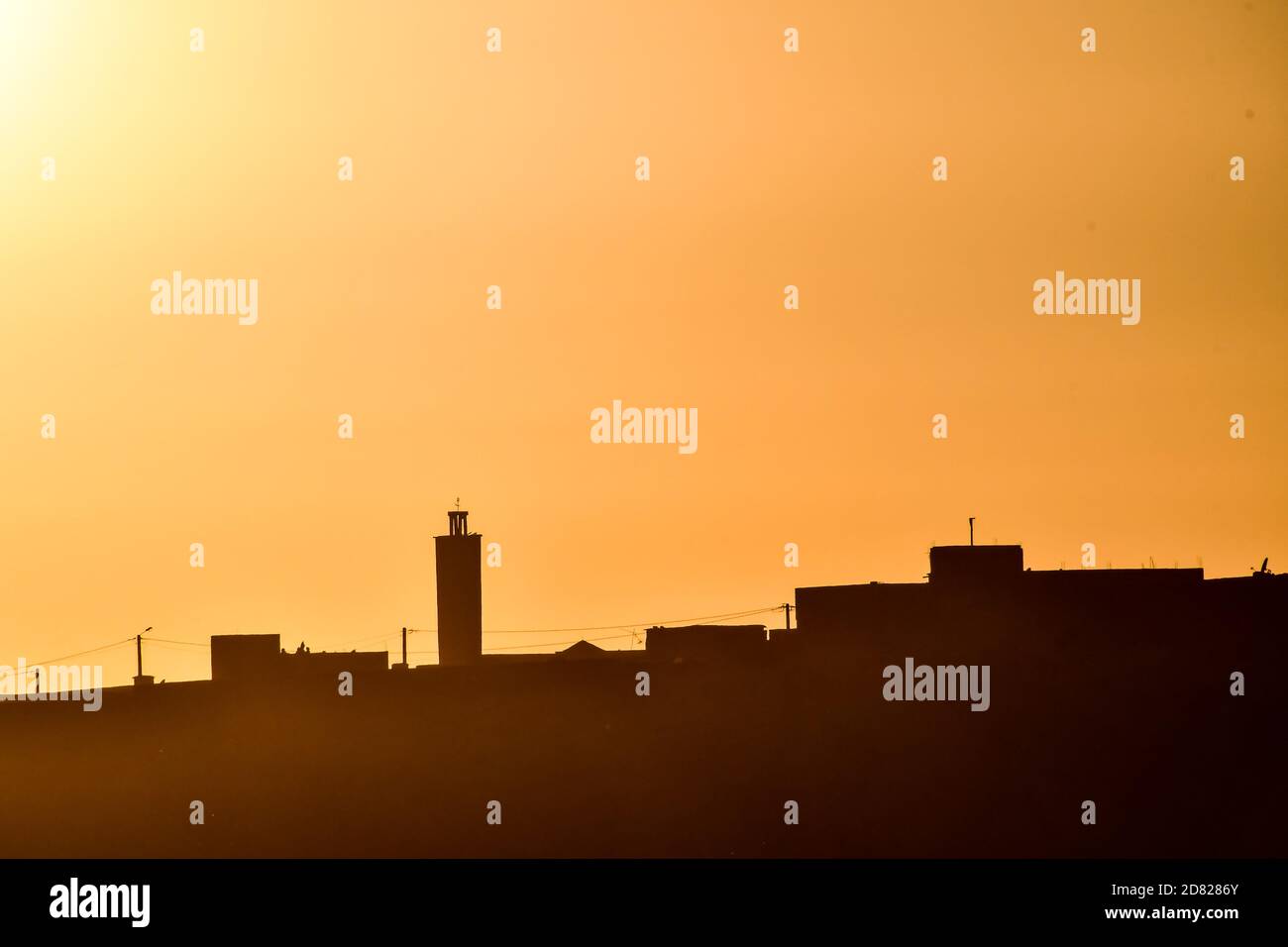 sunset over city, photo as background Stock Photo - Alamy