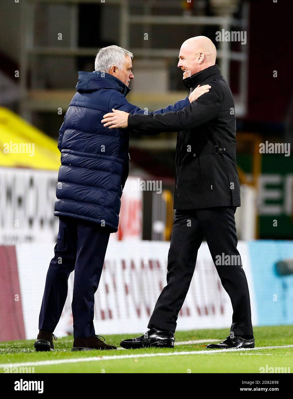 Tottenham Hotspur manager Jose Mourinho (left) greets Burnley manager ...