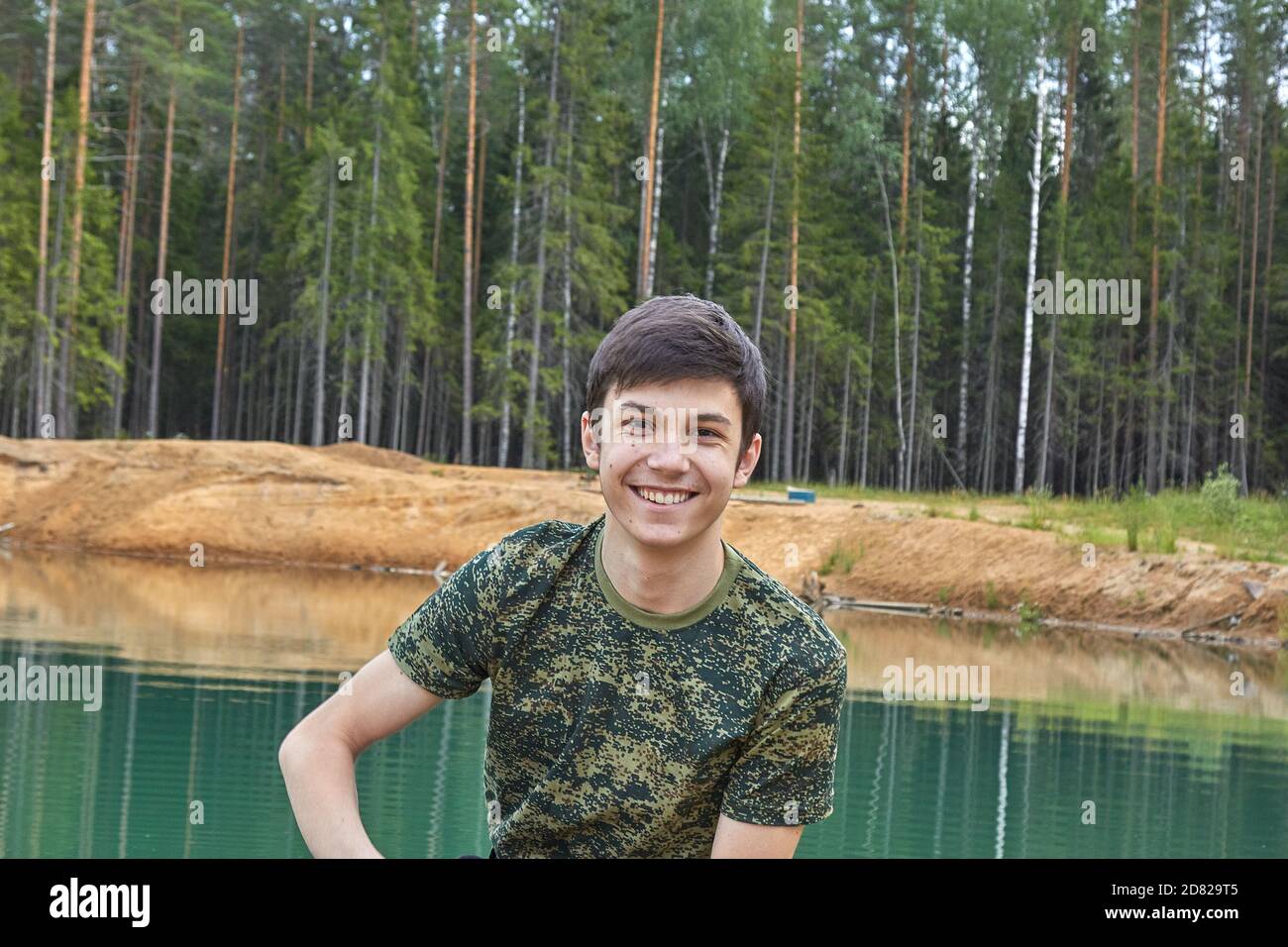 recreation in the forest camping in nature near the lake in summer ...