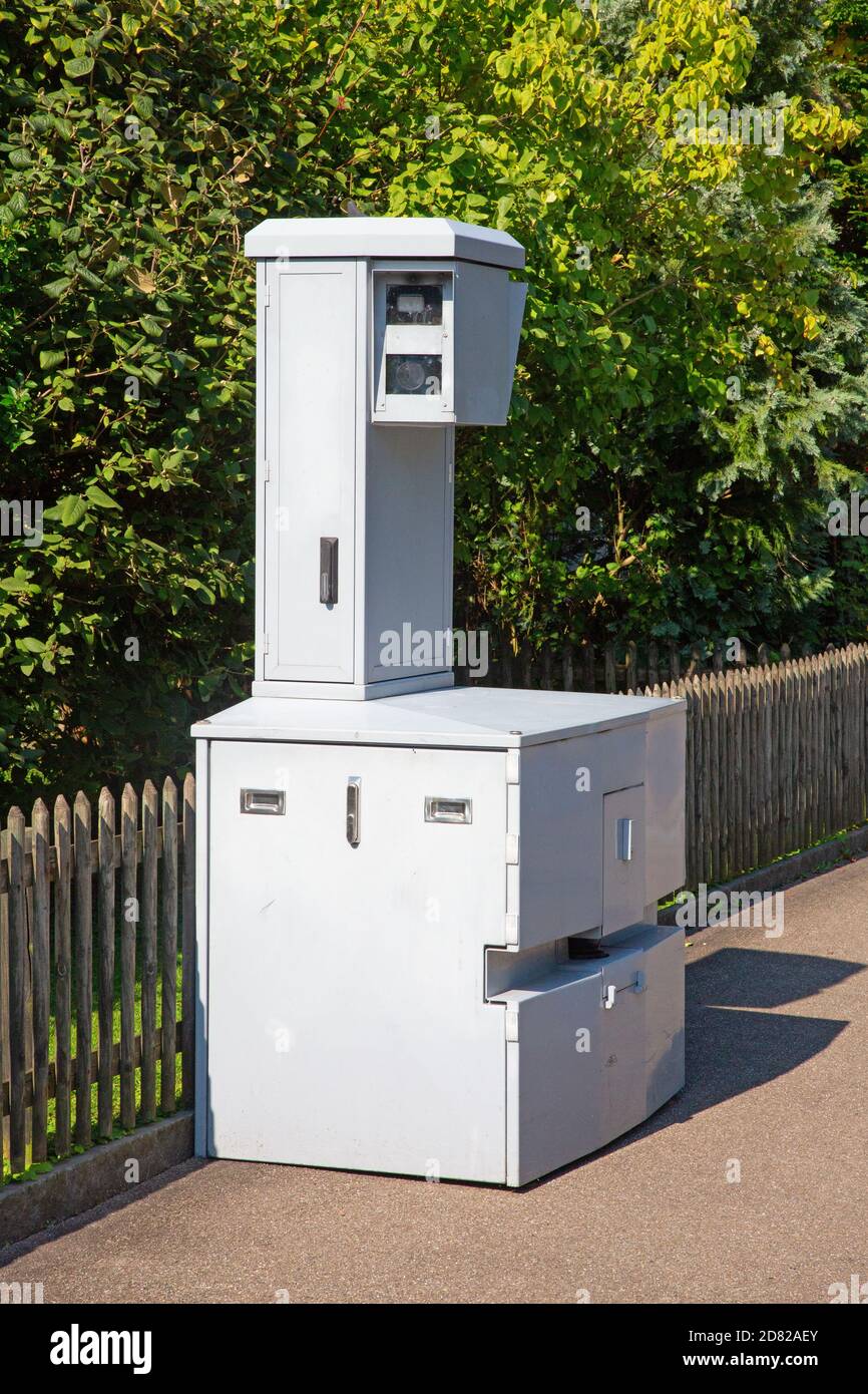 Speed camera on the narrow street of small swiss city. The 30 km/h is ...