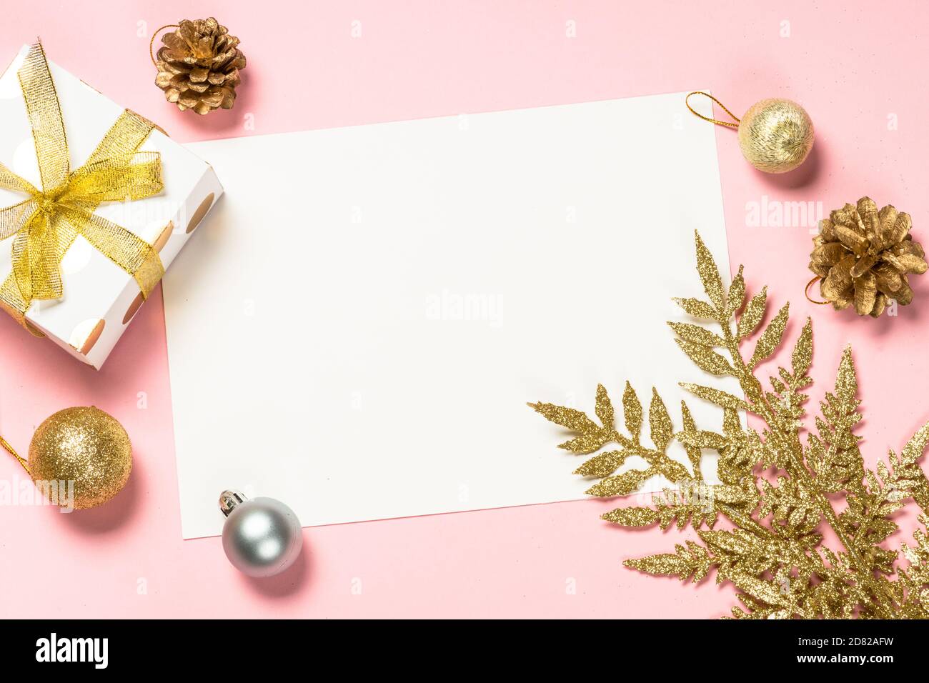 Christmas pink flat lay background with present box and decorations ...