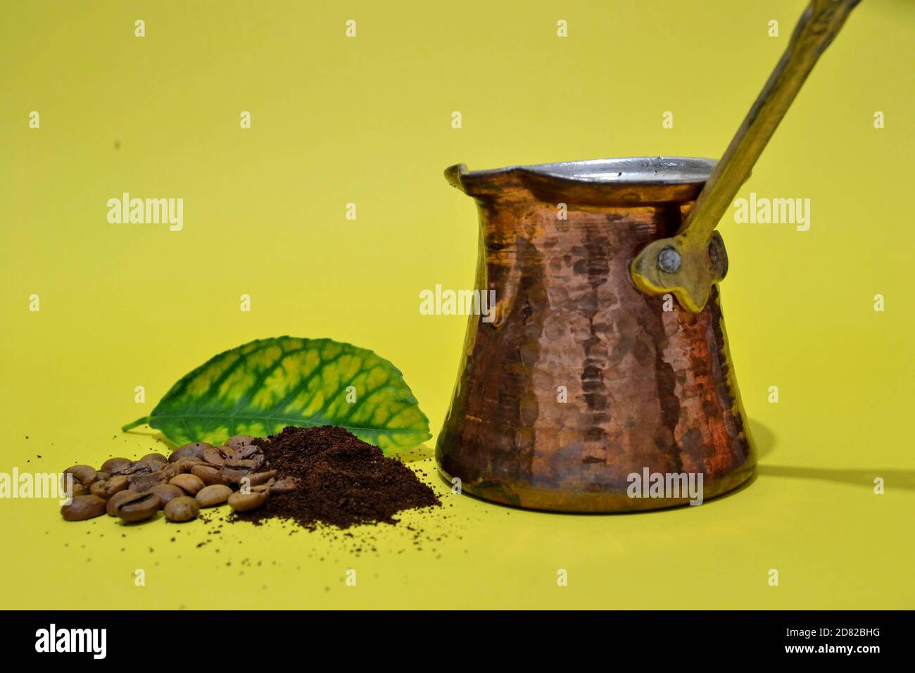 Cooked turkish coffee in traditional pot. coffee beans and roasted ...