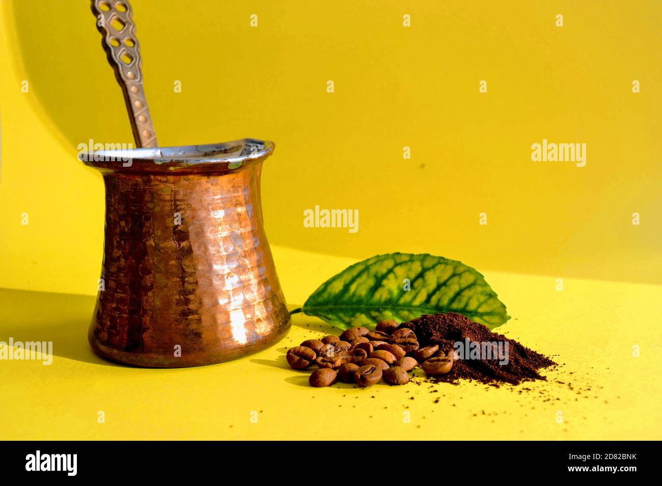 Cooked turkish coffee in traditional pot. coffee beans and roasted ...