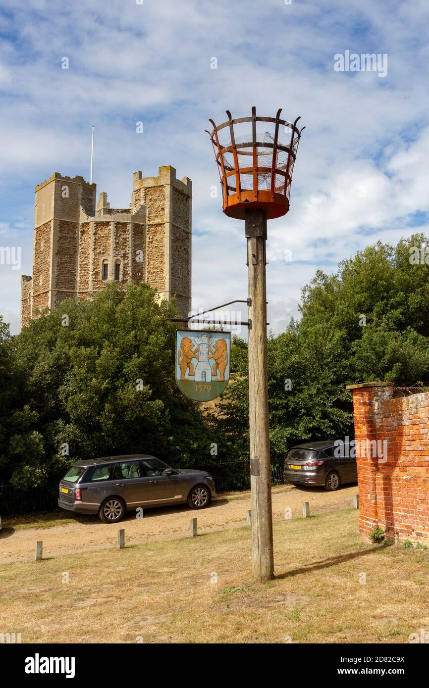 A beacon with the keep of Orford Castle in the background, Orford ...
