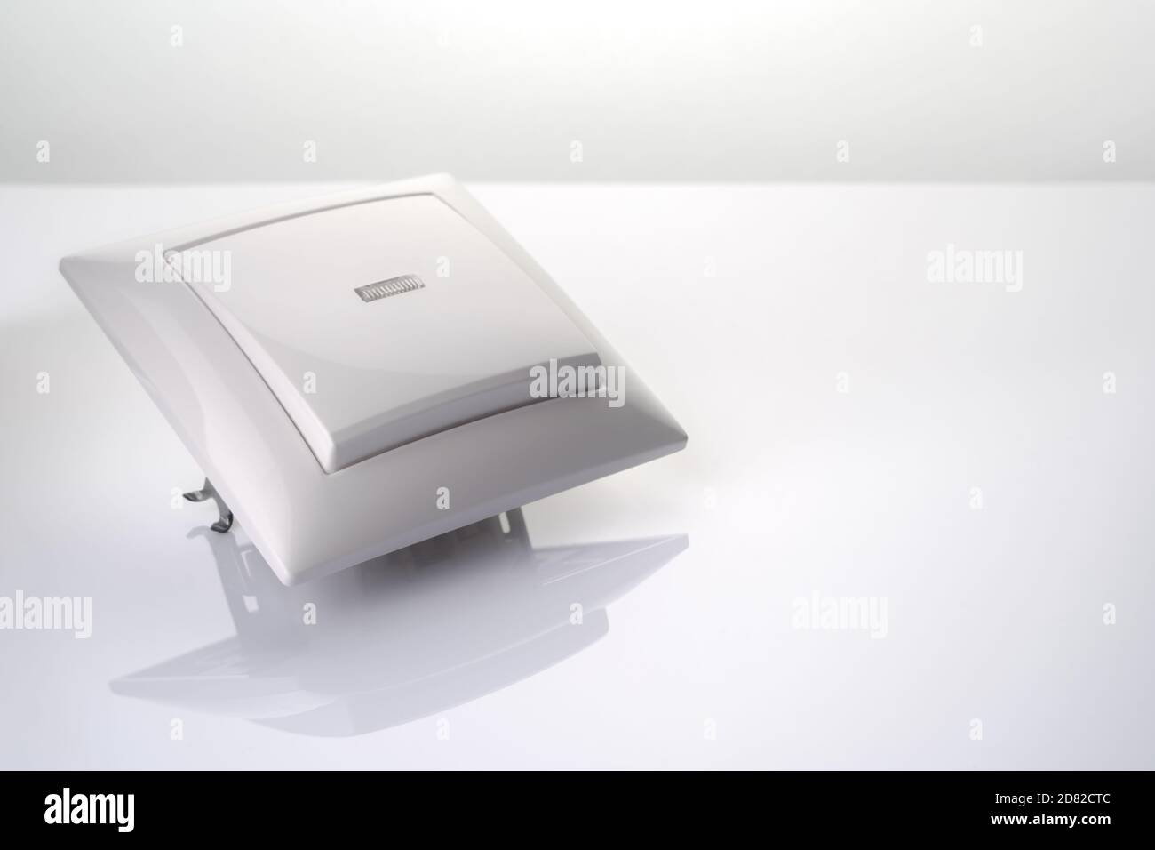 The design of square light switch on the glossy table Stock Photo - Alamy