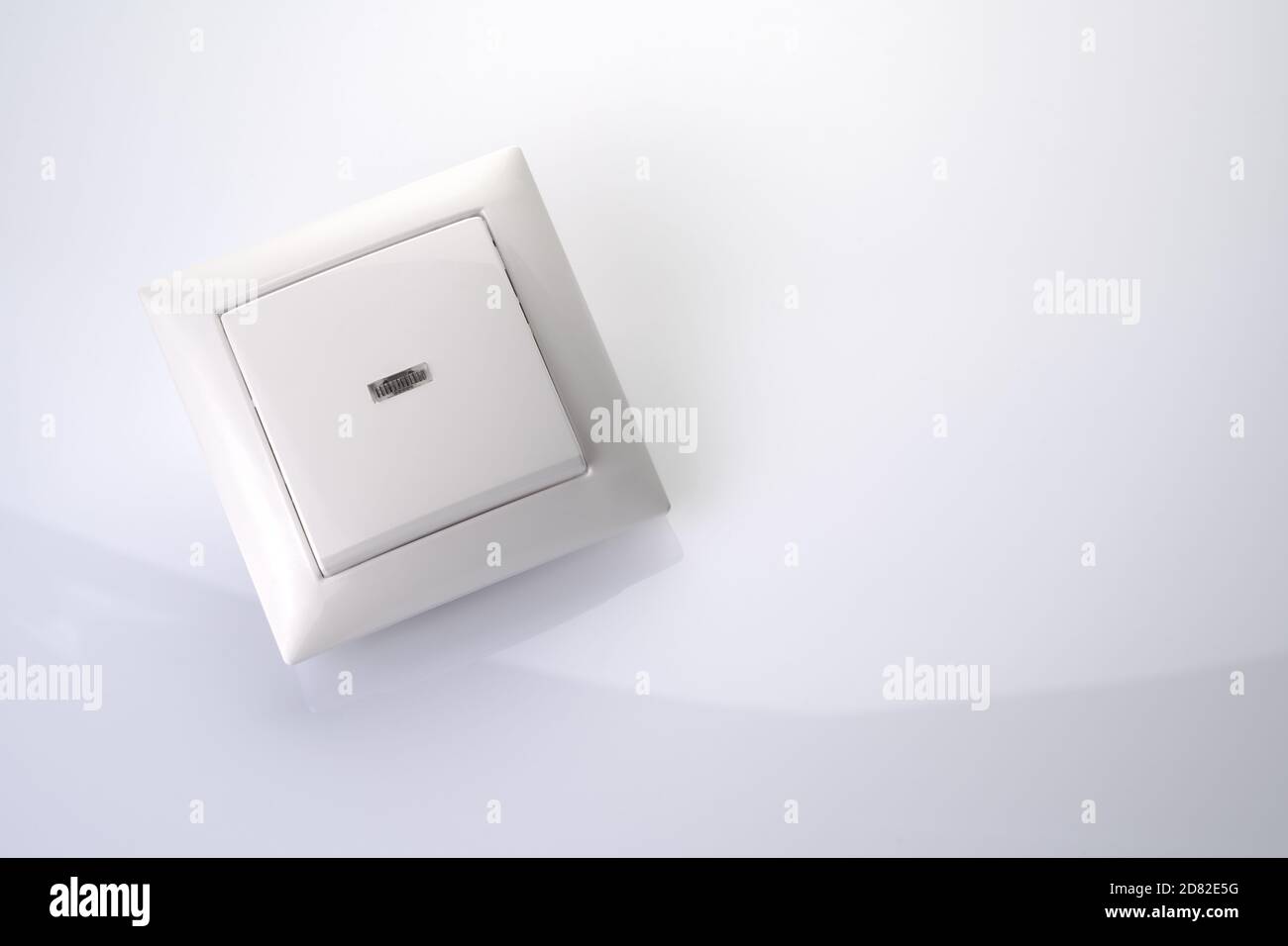 Electric light switch on a light background Stock Photo - Alamy