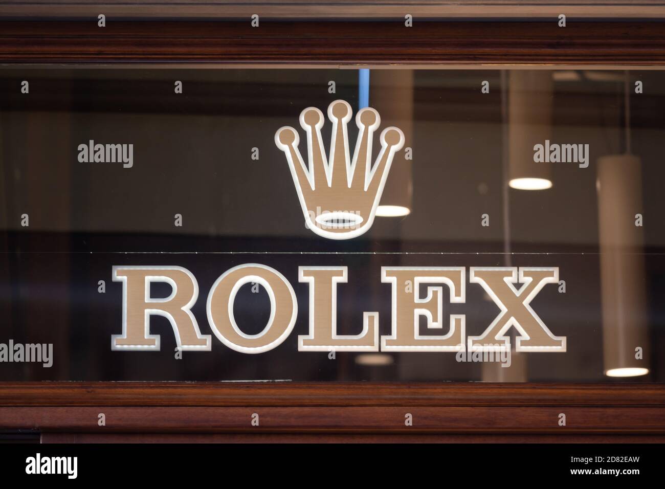 A Rolex watch store sign Stock Photo - Alamy