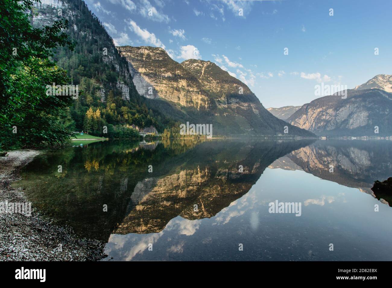 Mirror reflection in Hallstatter See,Austria. Summer spring colors lake ...