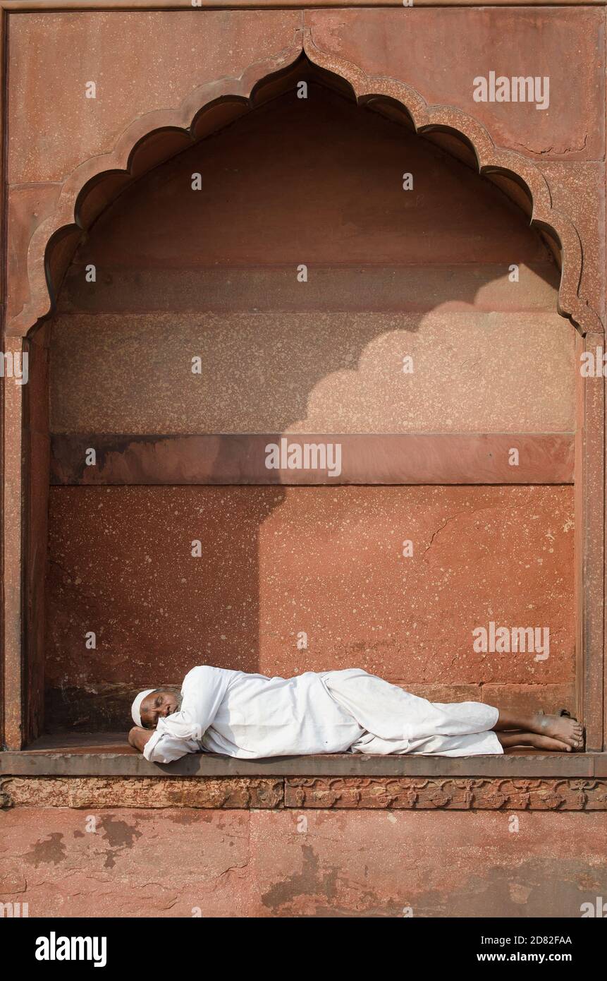 Muslim man asleep in a Mosque in India Stock Photo - Alamy
