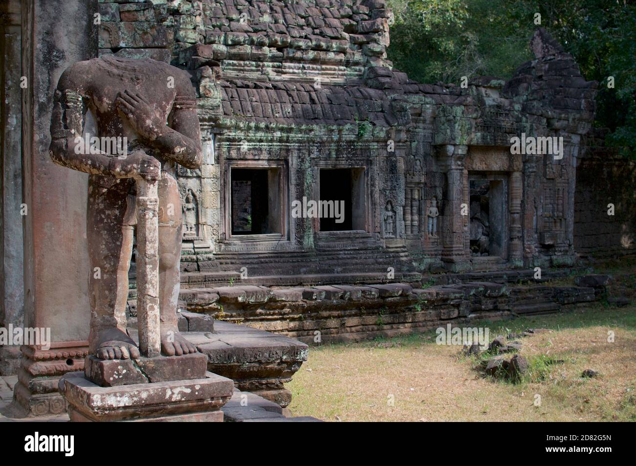 Headless Dvarapala warrior guardian statue at Preah Khan temple in ...