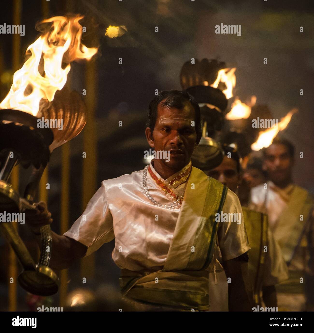 Hindu priests singing the Ganges river to sleep at the end of the day ...