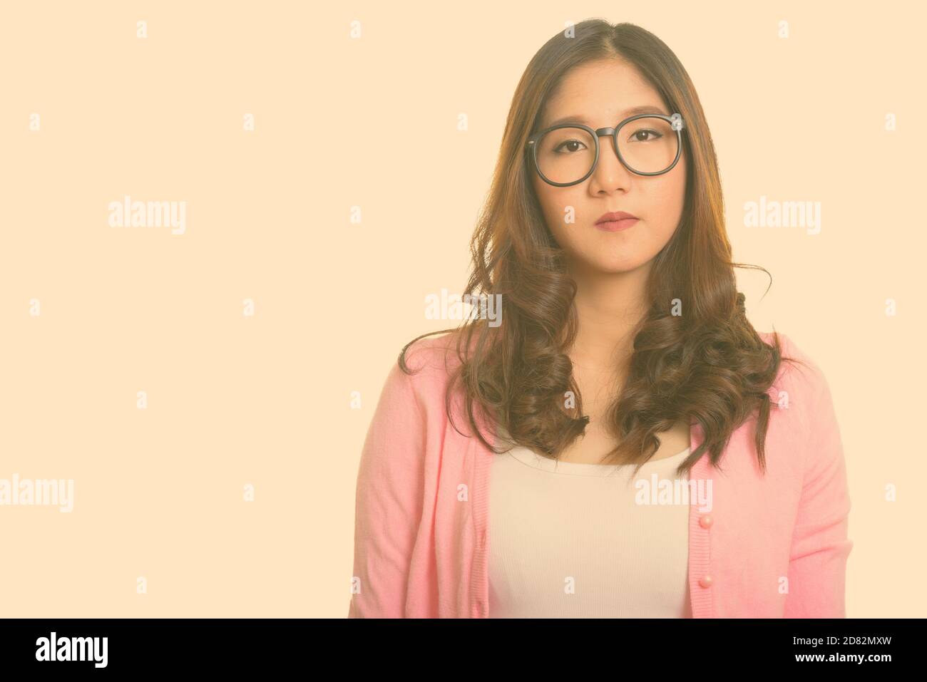 Portrait of young beautiful Asian nerd woman Stock Photo - Alamy