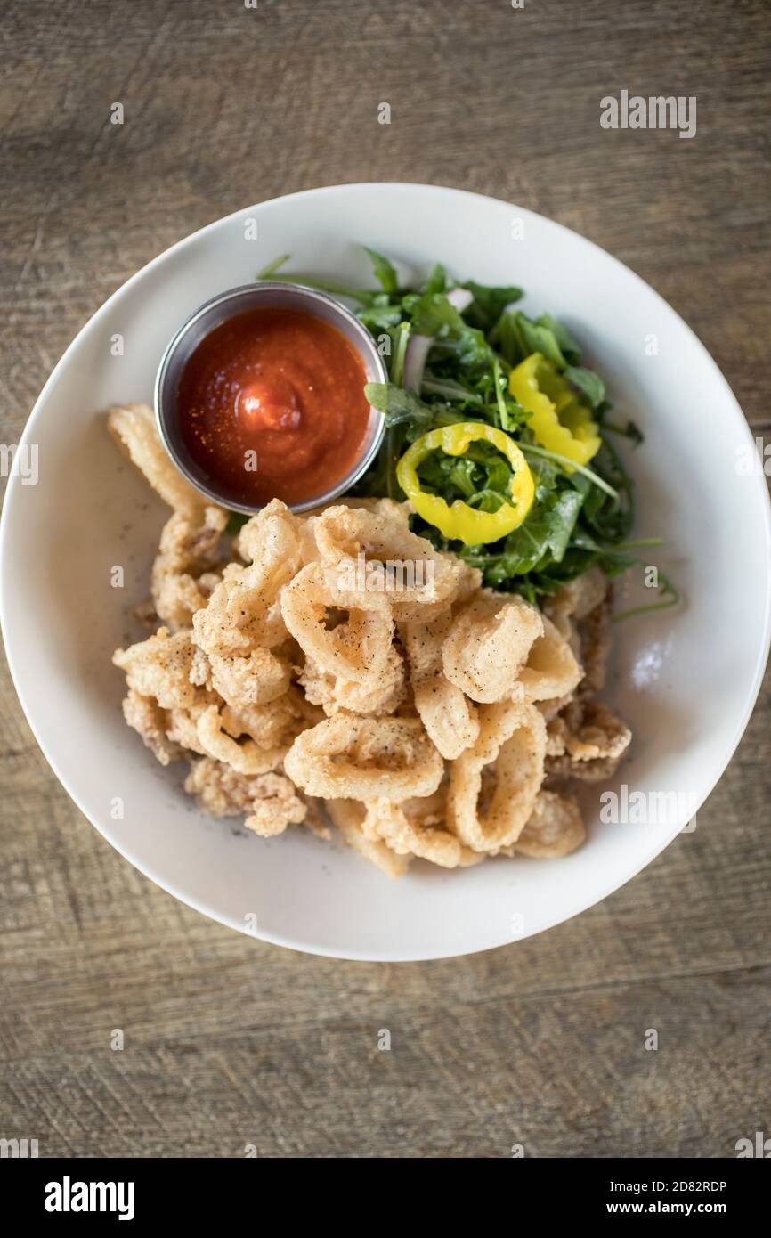 Fried Calamari in Italian Restaurant Stock Photo - Alamy