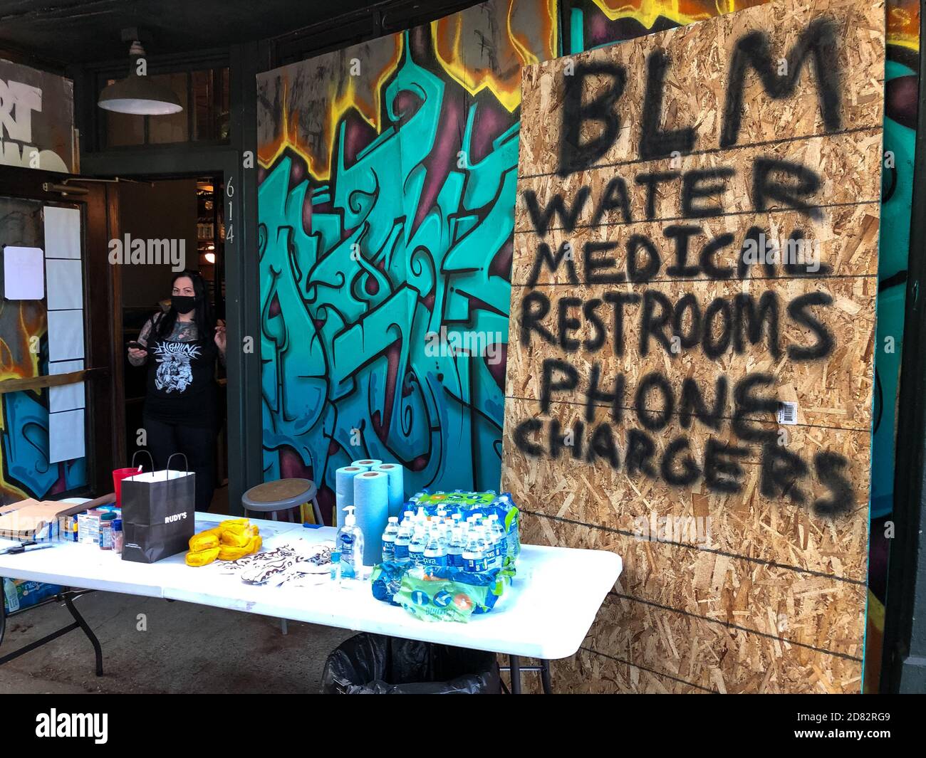 Seattle, USA Jun 4, 2020: Rudys aid table at Chaz located by the East ...