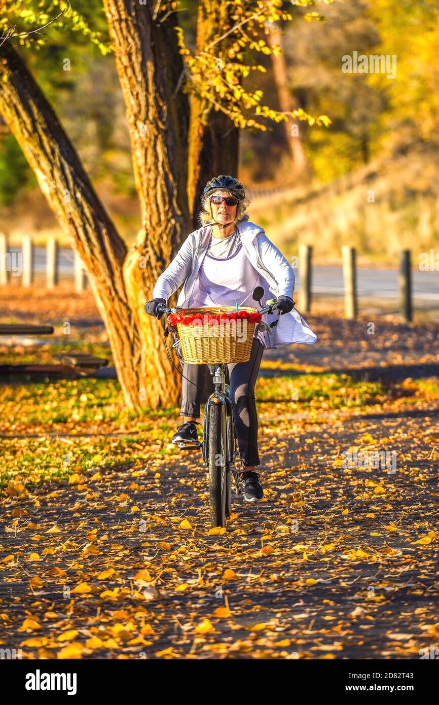 Beautiful women riding bicycle hi-res stock photography and images - Alamy