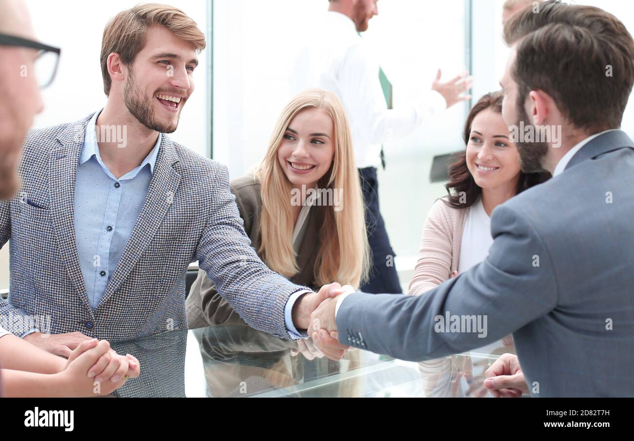 handshake business people at an informal meeting Stock Photo - Alamy