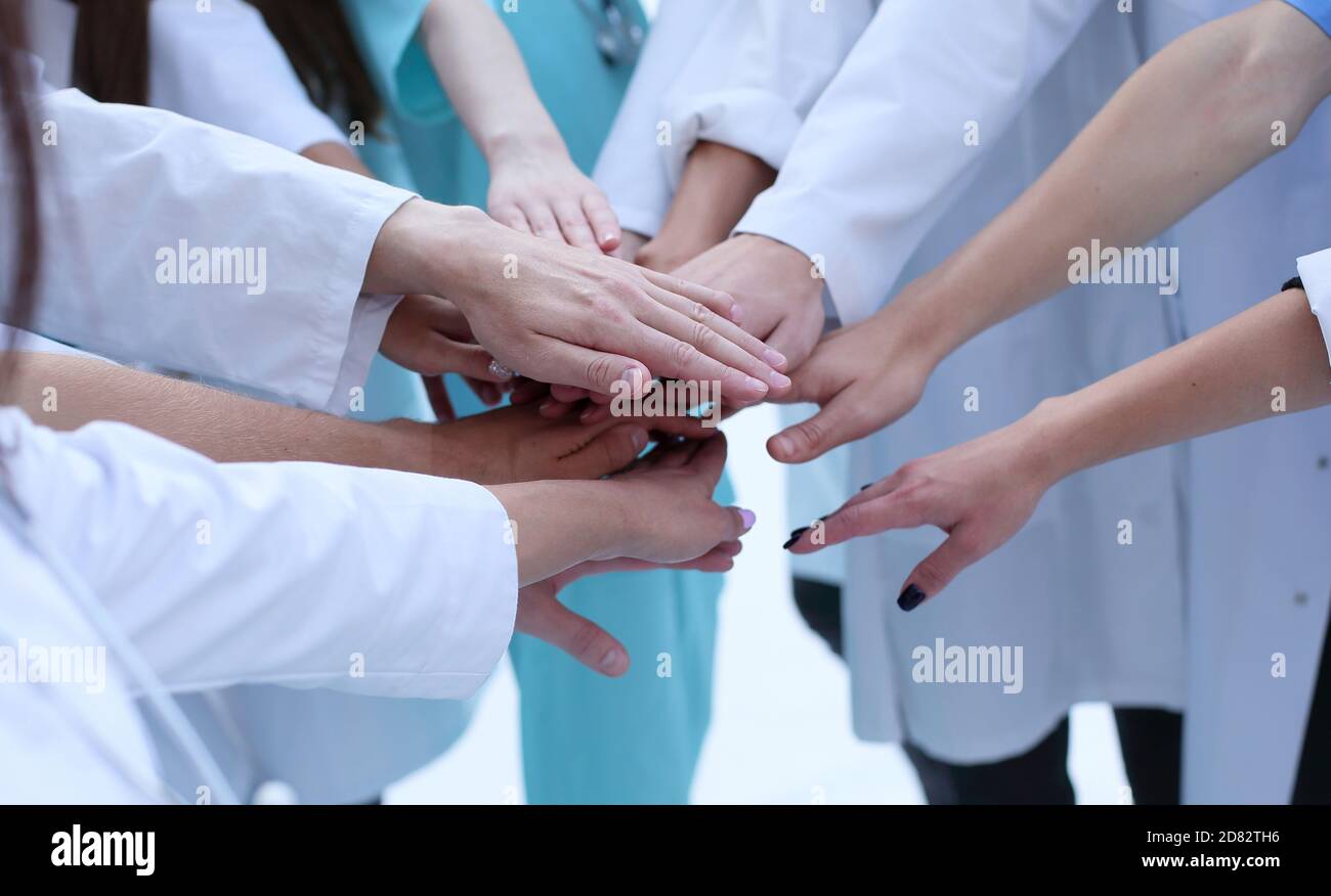 top view. a group of smiling doctors pointing at you Stock Photo - Alamy