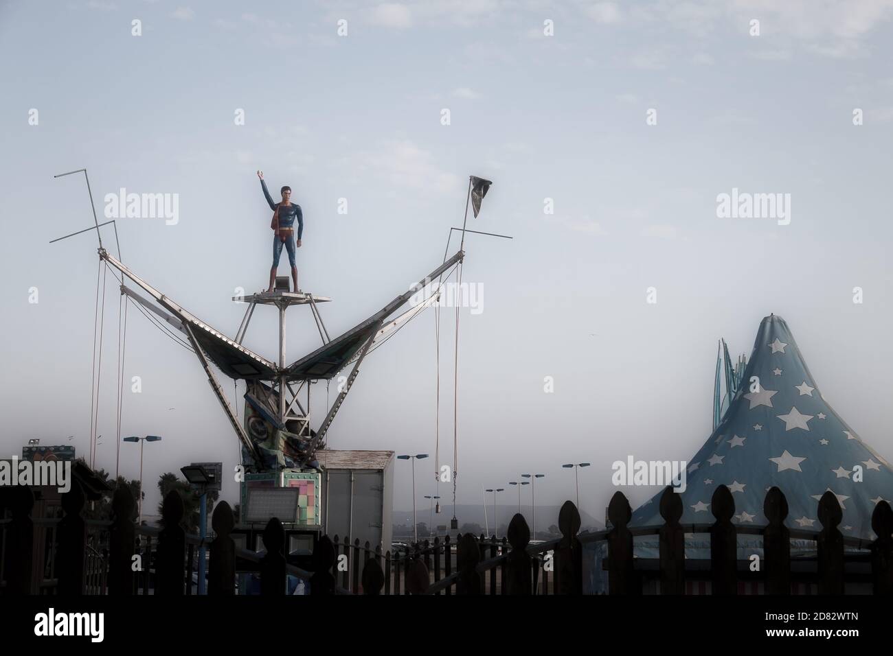 Attractions at a small fairground Stock Photo - Alamy