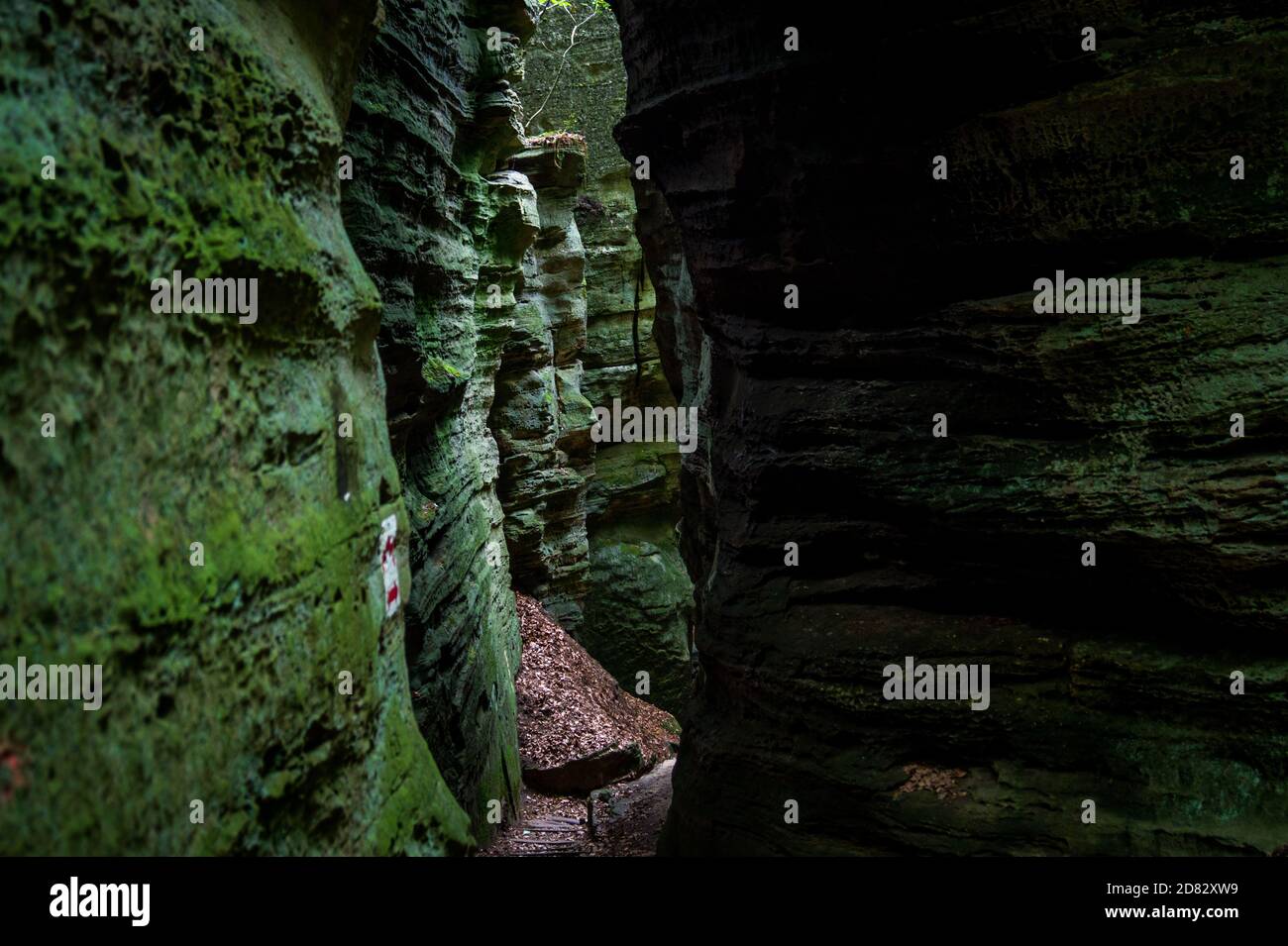 Passage through a crevice Stock Photo - Alamy