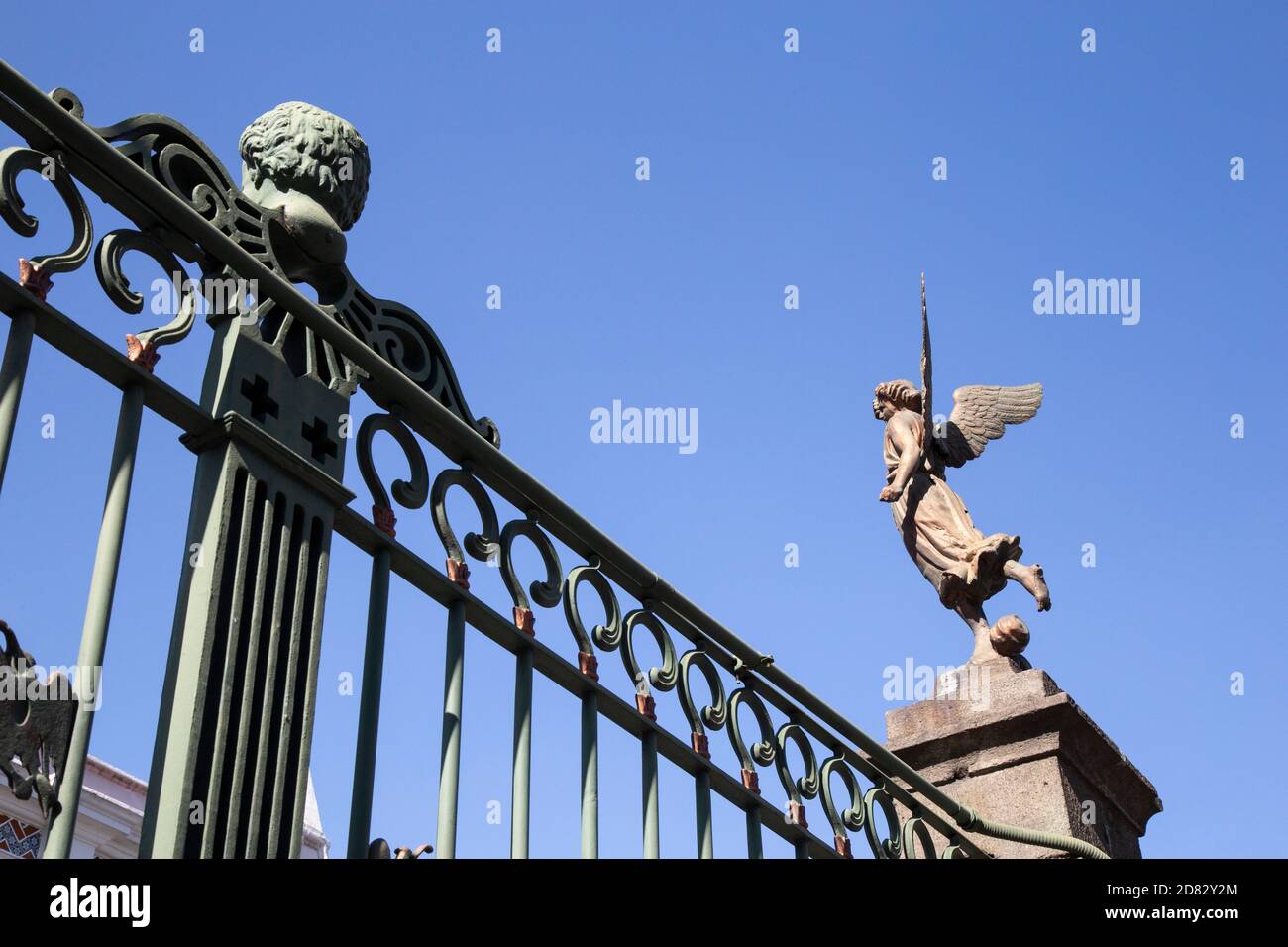 Angel statue on top of fence in downtown Puebla, Mexico Stock Photo - Alamy