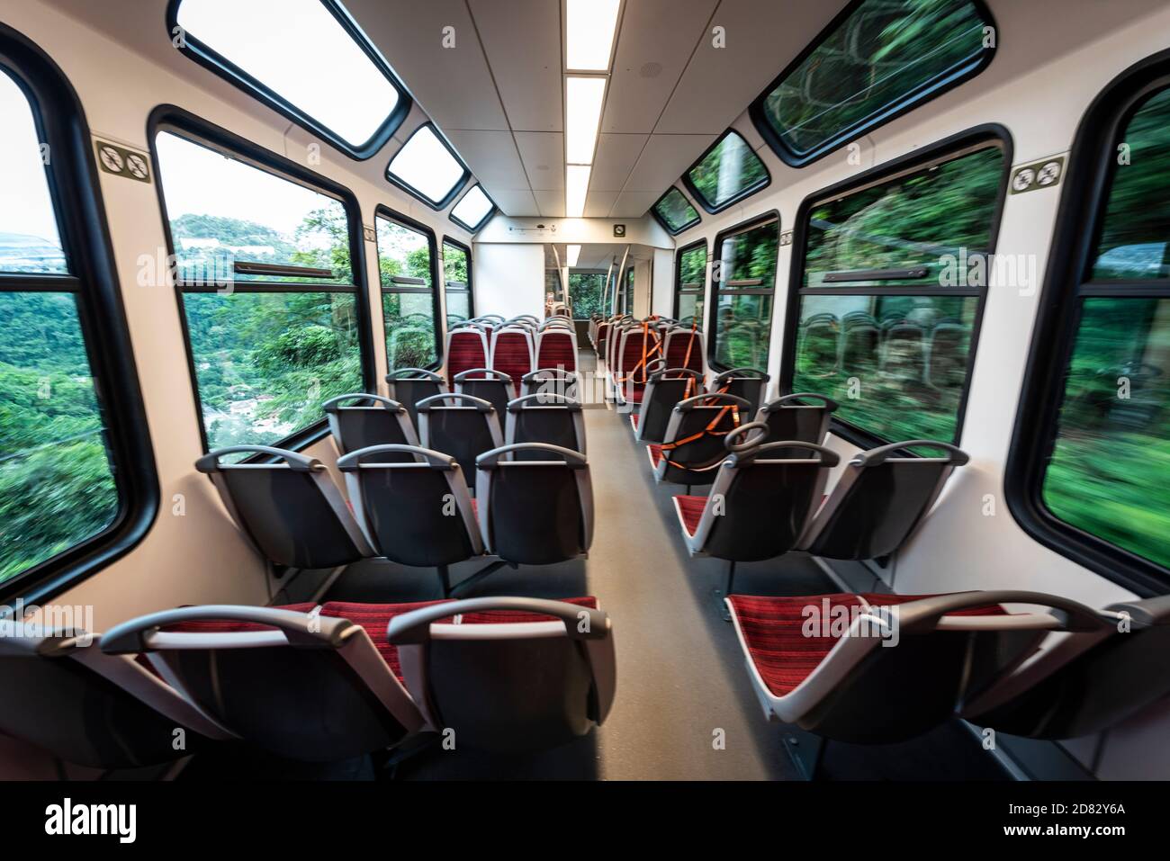 Inside an empty train going up to Christ the Redeemer Statue in Tijuca ...