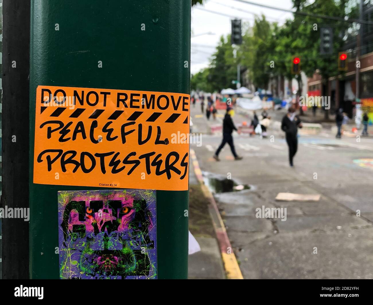 Seattle, USA – Jun 30, 2020: Sticker at CHAZ late in the day on Capitol ...
