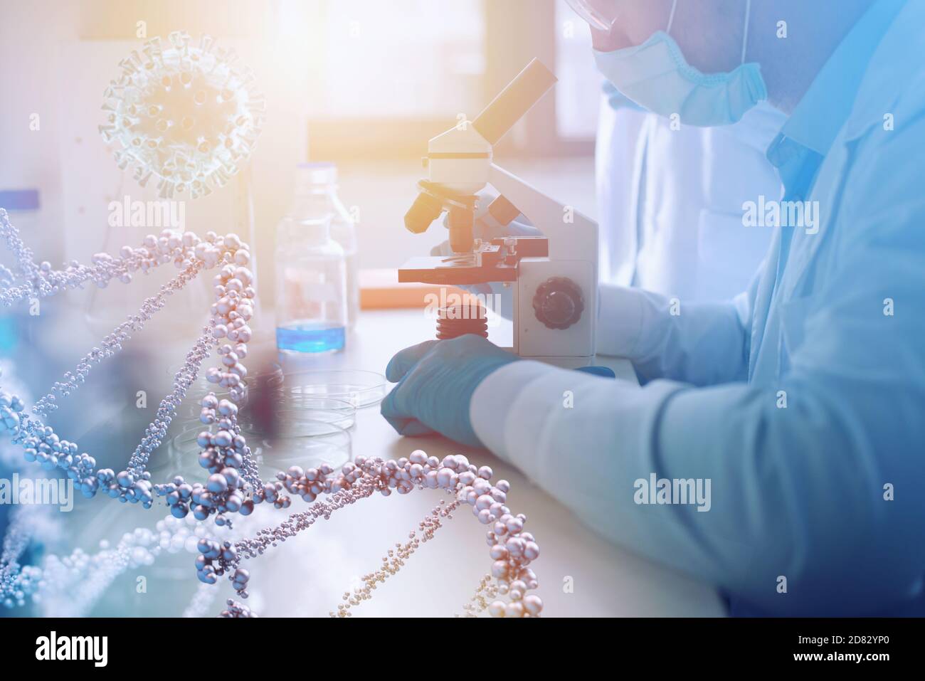 Doctor in the laboratory analyzes samples under a microscope ...