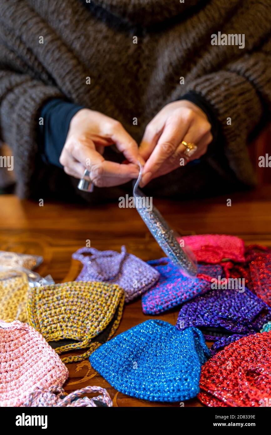 Tailor making face mask working hi-res stock photography and images - Alamy