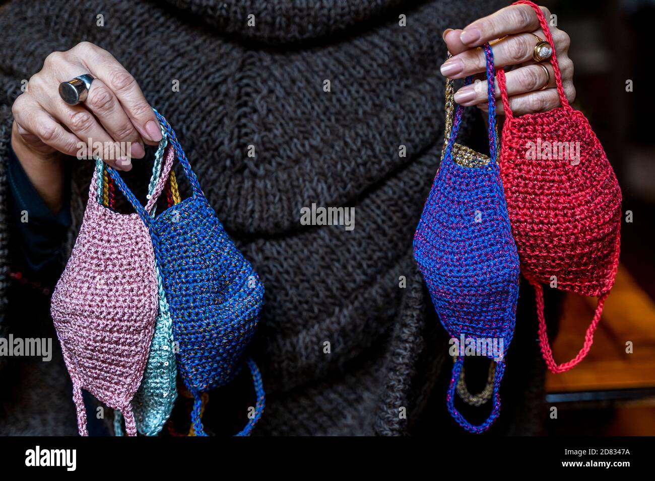 Tailor making face mask working hi-res stock photography and images - Alamy