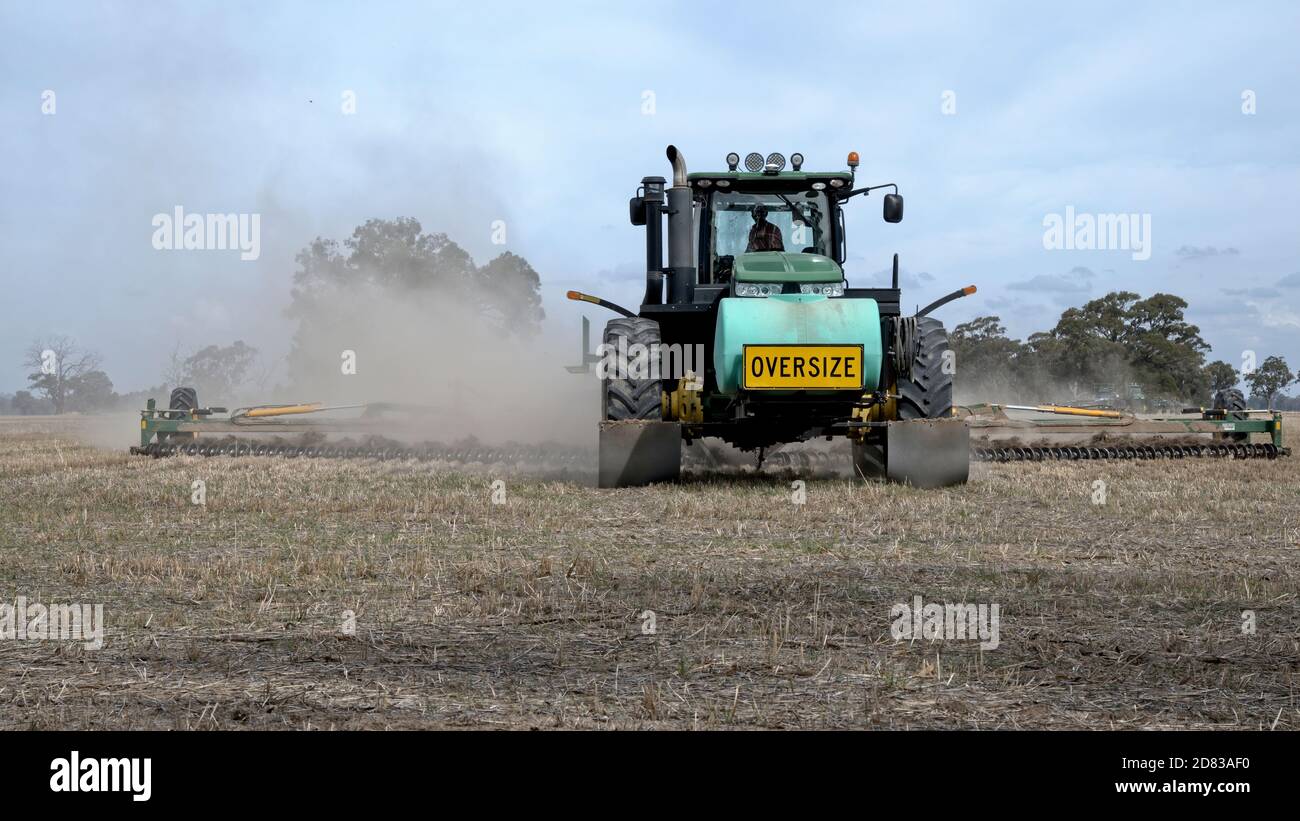 Tractor with disc harrow hi-res stock photography and images - Alamy