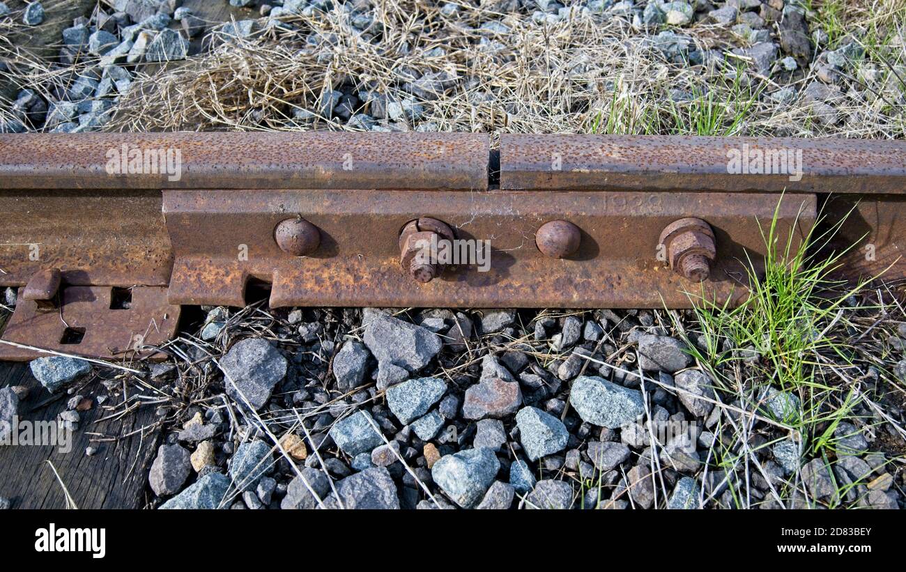 Old rusty piece of rail track which was made in 1928 Stock Photo - Alamy