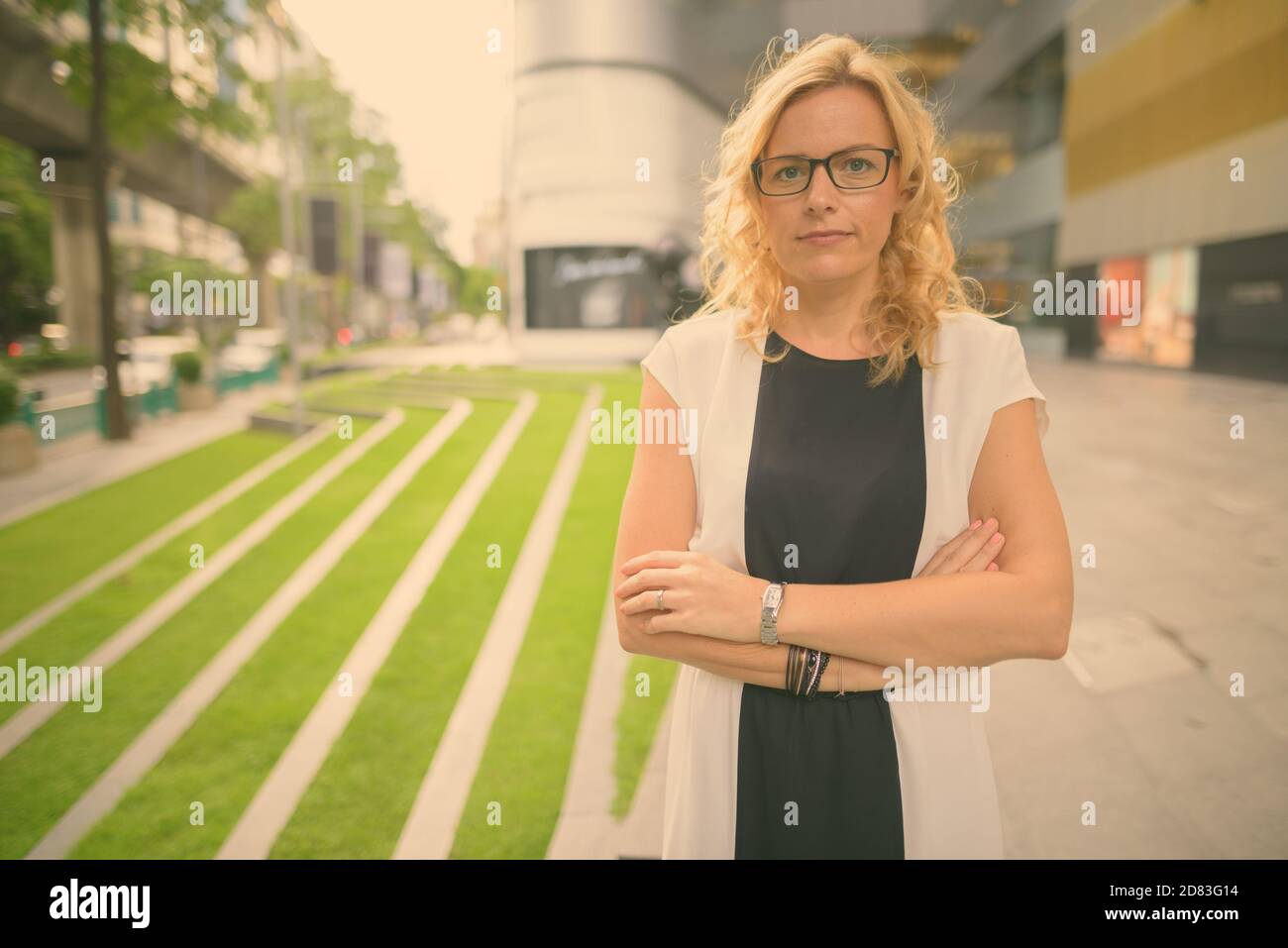 Beautiful Blonde Businesswoman Exploring The City Of Bangkok Thailand