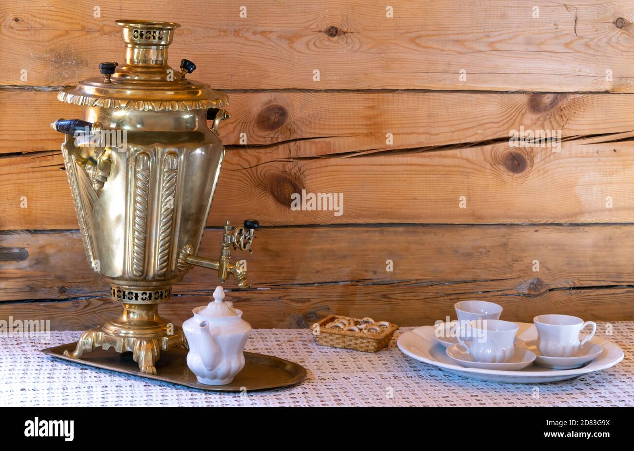 Russian samovar on the table. set table for tea Stock Photo - Alamy
