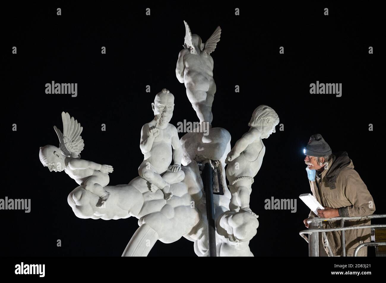 Stuttgart, Germany. 27th Oct, 2020. Sculptor Peter Lenk looks at his ...