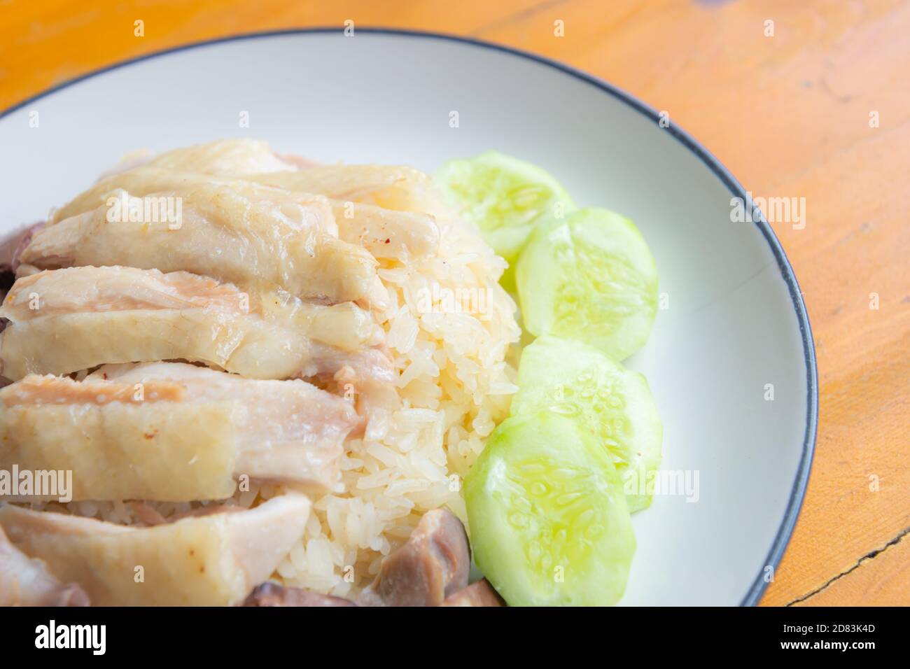 Hainanese chicken rice cucumber closeup hi-res stock photography and ...