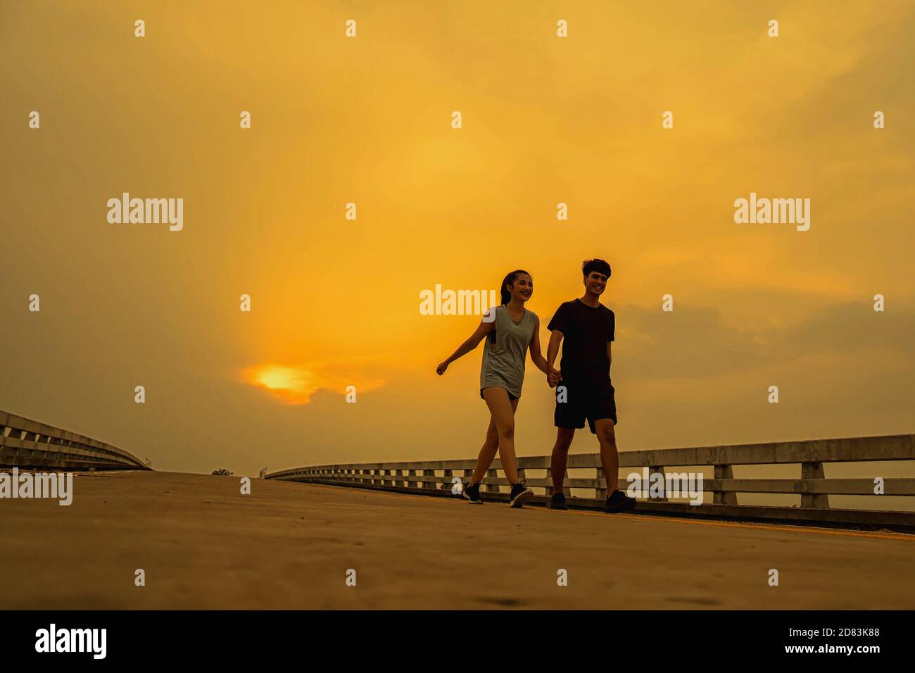 Jogging holding hands man woman hi-res stock photography and images - Alamy