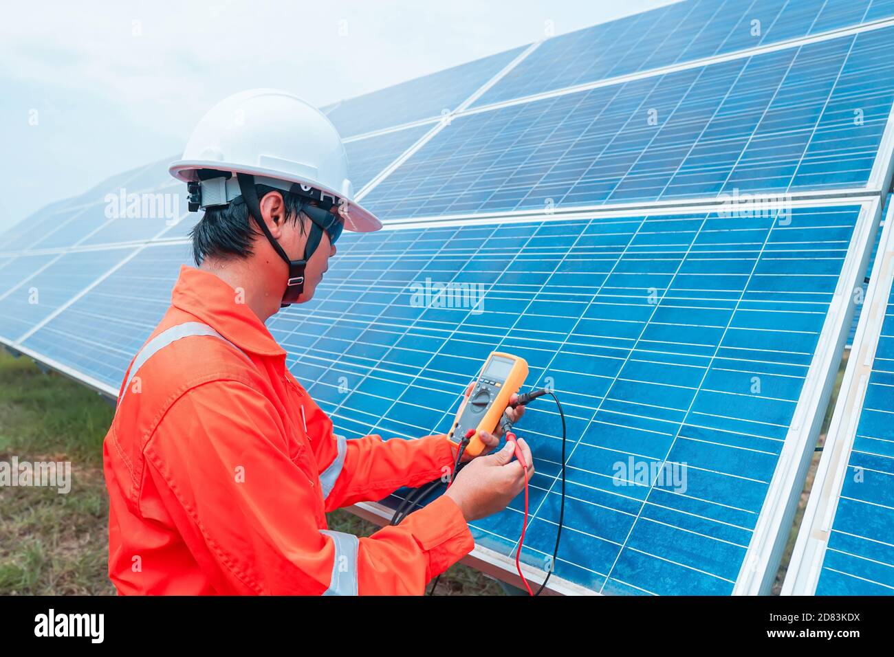 Engineers used a tool for checking the performance of the solar panel ...