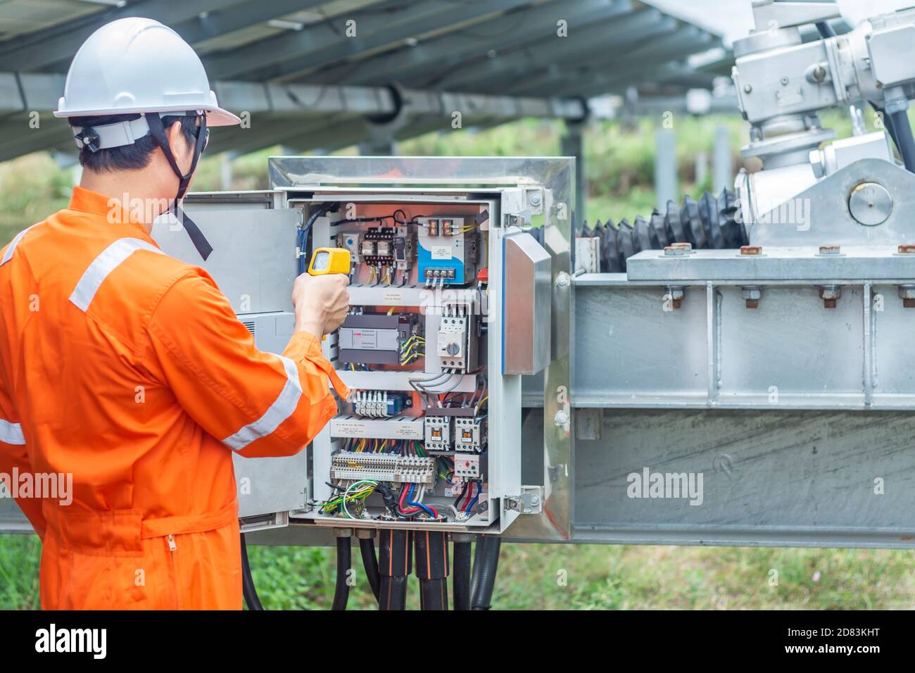 Engineers used a Thermo gun for checking the temperature of the ...