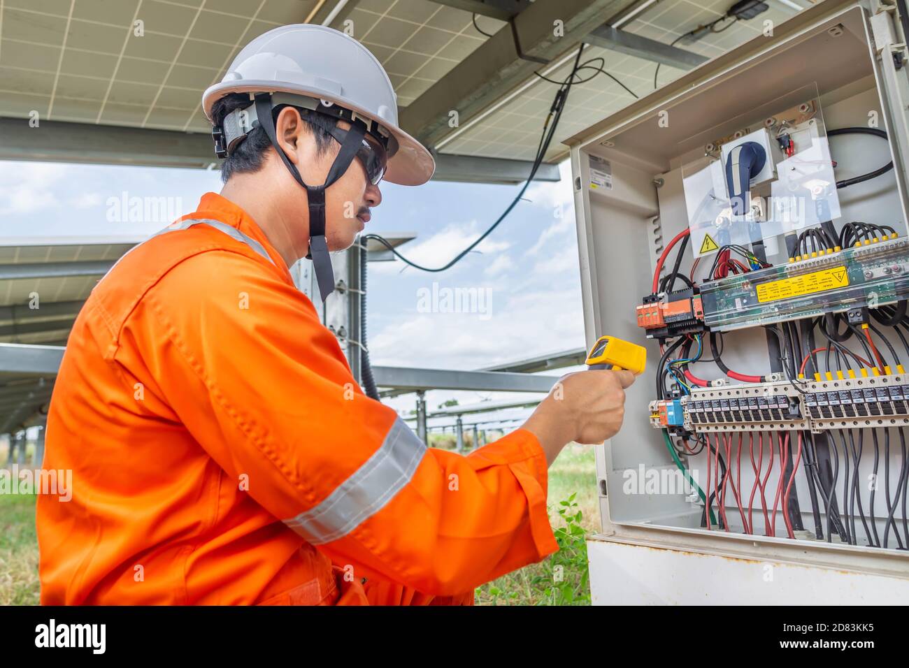 Engineers used a Thermo gun for checking the temperature of the ...